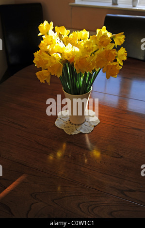Vase with beautiful daffodils on dark background Stock Photo - Alamy