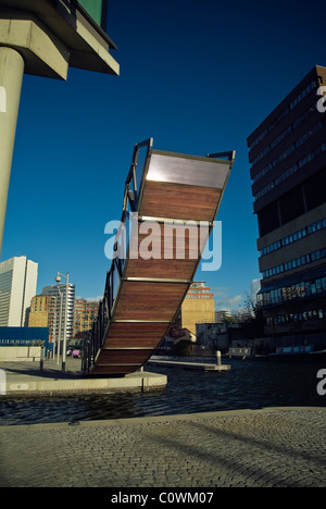 Heatherwick Studio's Rolling Bridge in mid-roll at Paddington Basin ...