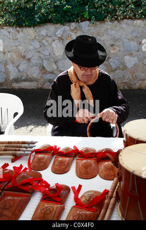 Man making castanets at a traditional Handicraft Fair, Ibiza, Spain ...