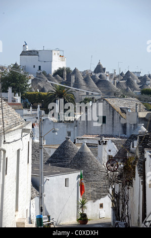 Italy, Alberobello, historic centrer with trullo houses with new center ...