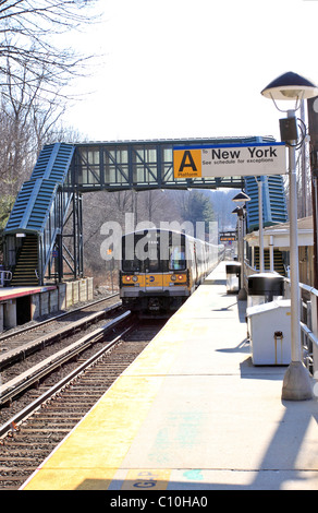 A long island railroad train arriving on the platform at the Babylon ...