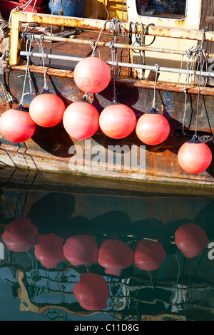 Closeup of red buoys in the boat under the sunlight Stock Photo - Alamy