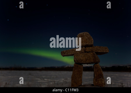 Inuit stone man, inukshuk, stone landmark or cairn, Northern polar ...