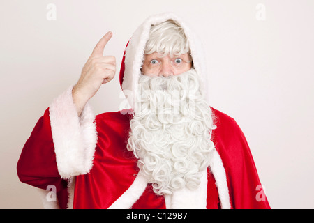 Santa Claus threatening, wagging his finger Stock Photo - Alamy