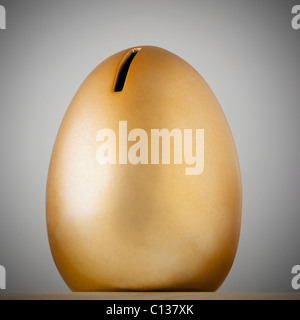 Egg of Money Stock Photo - Alamy