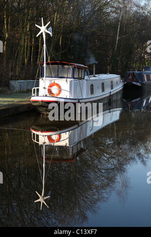 small wind turbine on a barge boat Stock Photo - Alamy