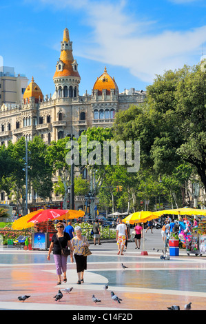Pedestrians walk in Plaza de Armas in downtown Santiago, Chile, Tuesday ...