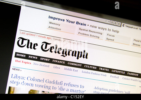 The logo of The Telegraph newspaper displayed on the screens of a ...