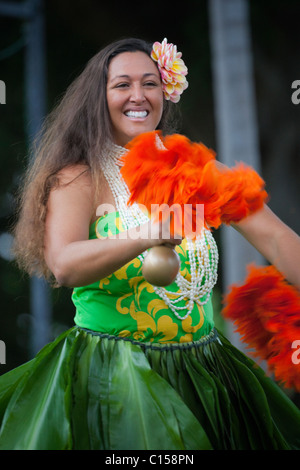 Hawaii, Kona, Traditional kahiko hula dancer with pu'ili (bamboo rattle ...