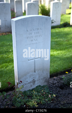 Grave of an unknown British soldier killed on D-Day (June 6, 1944) at the Bayeux Commonwealth ...