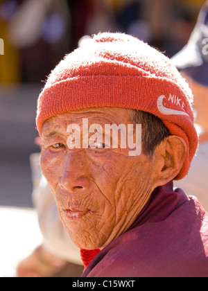An older Bhutanese man in the traditional gho robe in Thimphu, Bhutan ...