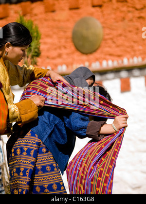 Bhutanese woman wearing traditional kira and shawl at Black-necked ...