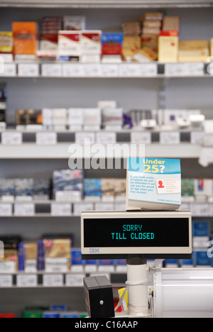 Cigarette Display Behind A Shop Counter Stock Photo - Alamy