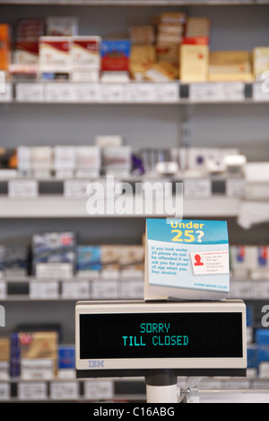 Cigarette Display Behind A Shop Counter Stock Photo - Alamy