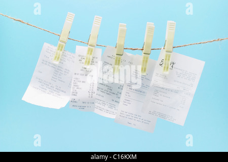 Receipts Hanging on String Stock Photo - Alamy