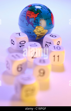 Globe and Dice Stock Photo - Alamy