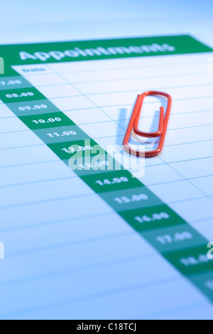 Paperclip on Calendar Stock Photo - Alamy