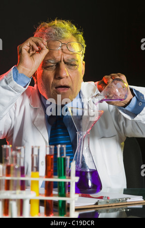 A vertical shot of a scientist doing a research in a laboratory Stock ...