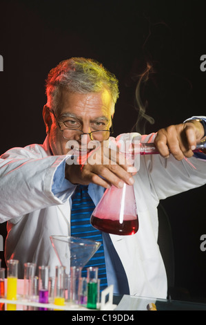 A vertical shot of a scientist doing a research in a laboratory Stock ...