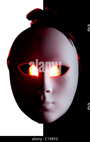 Creepy mask with white face and red eyes, dishevelled grey hair Stock ...