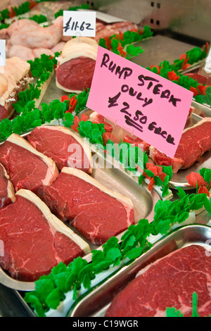 Beef steak on display in a butchers shop Stock Photo - Alamy