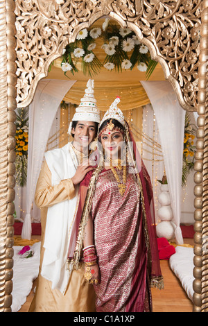 Bengali woman standing with her hand on chin Stock Photo - Alamy