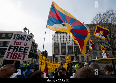 Several hundred supporters of a free Tibet March from Parliament Square ...
