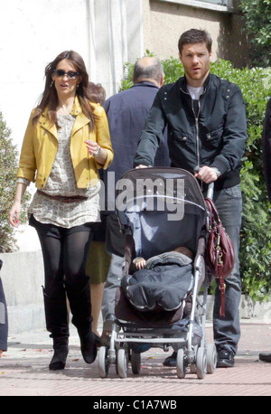 Xabi Alonso with girlfriend Nagore Aranburu and their baby Jontxu ...