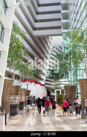 Interior of the modern atrium of the Marina Bay Sands Shopping Center ...
