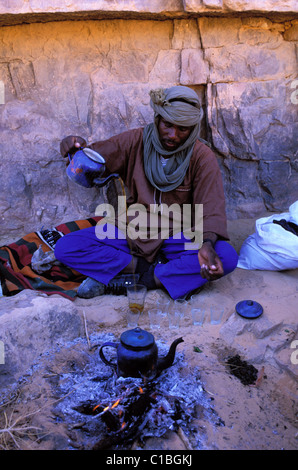 Africa, Algeria, Sahara. Tea ceremony in desert, Touareg dressed in ...