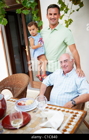 Portrait of three generation family having fun on Diwali at home Stock ...
