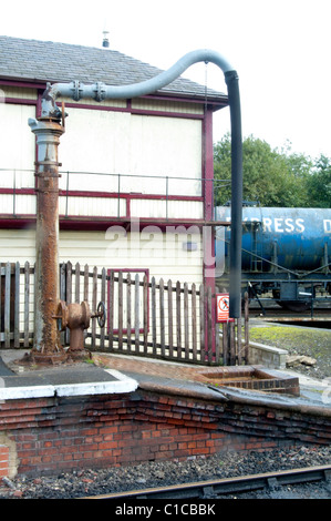 Old steam locomotive water spout refill station metal pipe hose Stock ...