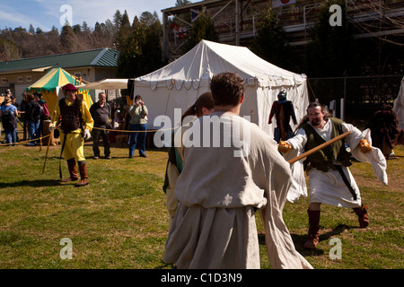 Burly men demonstrating their sword fighting technique at the Sonora ...