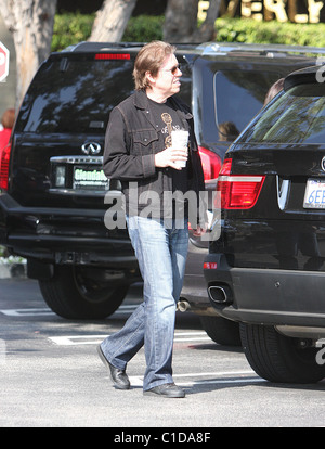 Rock 'n roller George Thorogood, 56, leaves a coffee shop holding hands ...