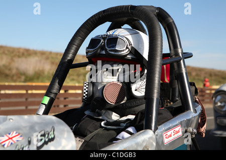 Drag racing driver face mask Stock Photo - Alamy