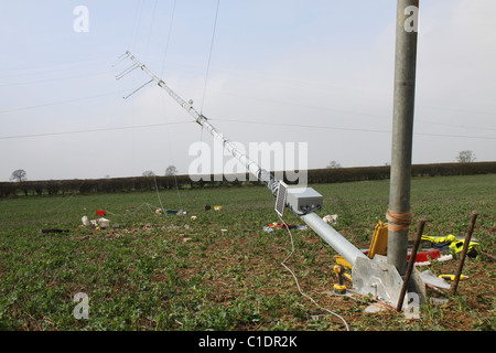 Wind-monitoring meteorological mast (met mast) with data logger being ...