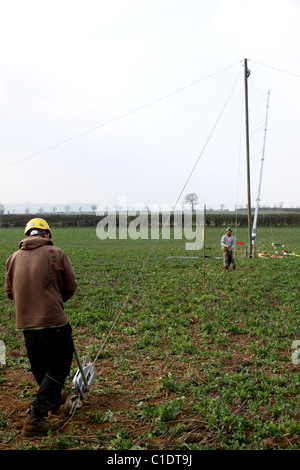 Wind-monitoring meteorological mast (met mast) with data logger being ...
