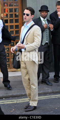 Funnyman Jimmy Carr leaving the Ivy Restaurant, wearing a beige suit ...