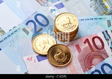A stack of Krugerrands on Euro notes Stock Photo - Alamy