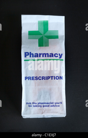 NHS pharmacy prescription paper bag with foil tablet packets/blister ...