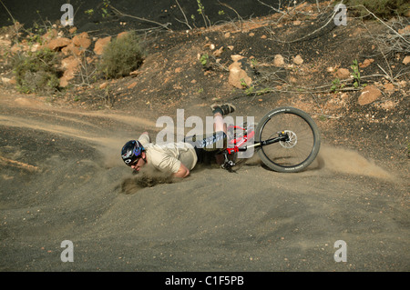 A Man crashes on his Mountain Bike Stock Photo - Alamy