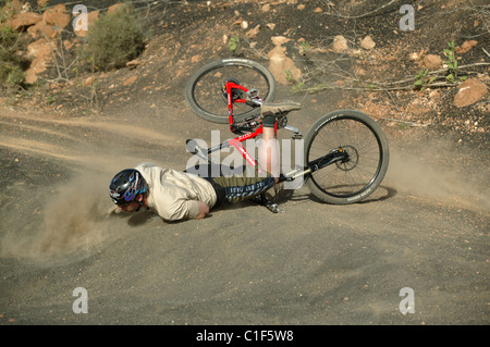 Man falling off mountain bike Stock Photo - Alamy
