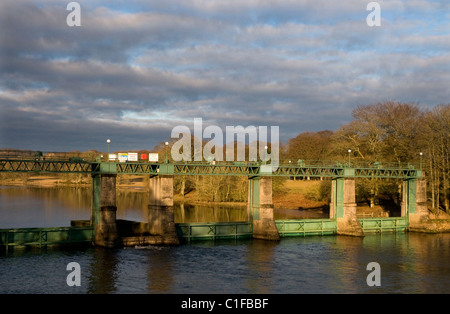 sluice gates of Glenlochar Barrage on the River Dee which is part of ...