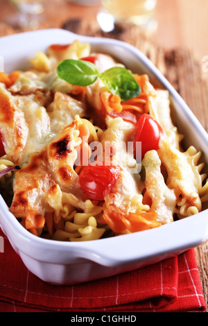 Corkscrew pasta with cherry tomatoes and smoked cheese Stock Photo - Alamy