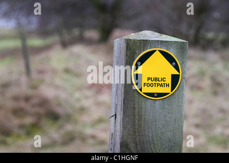 PUBLIC FOOTPATH wooden sign denoting public right of way. Route of ...