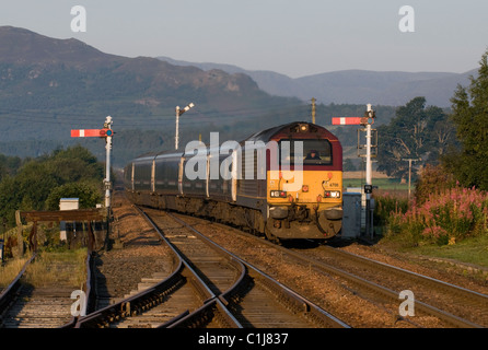 A Class 67 diesel locomotive number 67026 with an ECS working formed of ...