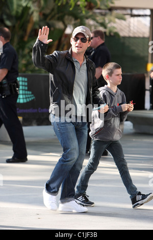 Christian Slater and his son Jaden, arrive for the first game of the ...