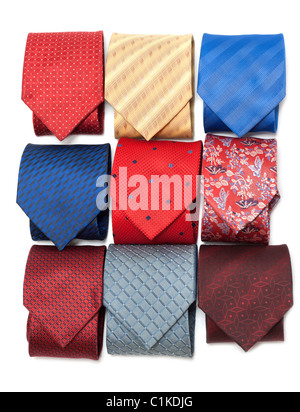 Varicoloured male ties convolute on white background Stock Photo - Alamy