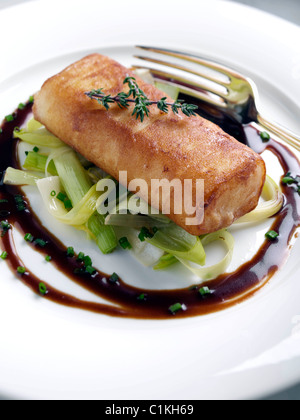 Fish en paupiette with a bed of sauteed leeks and Barolo sauce main ...