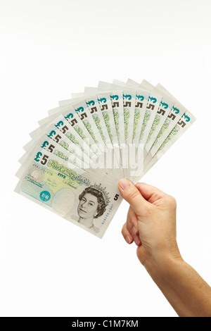 Fan of Five Pound Notes with Hand Stock Photo - Alamy